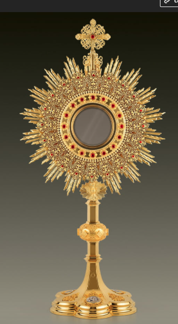 Monstrance with rays and filigree openwork, gold plated brass